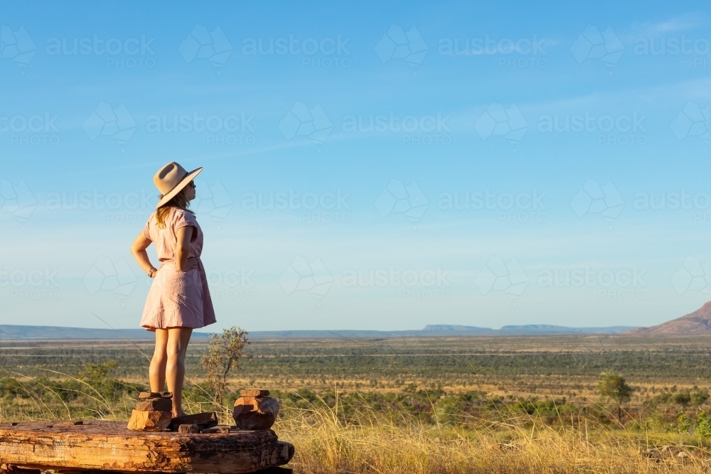 Image of person standing and looking out over Kimberley landscape ...