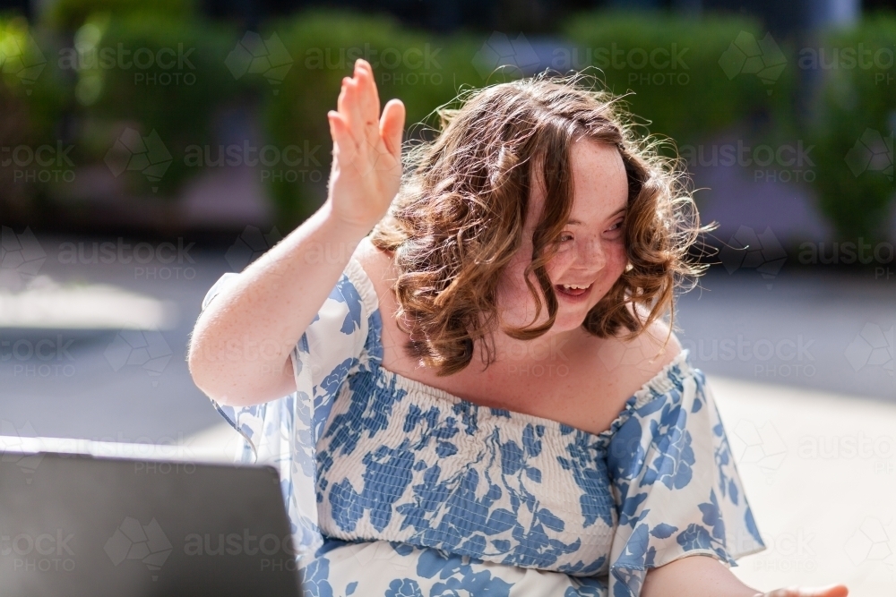 Image of Person with down syndrome clapping and moving in happy way ...
