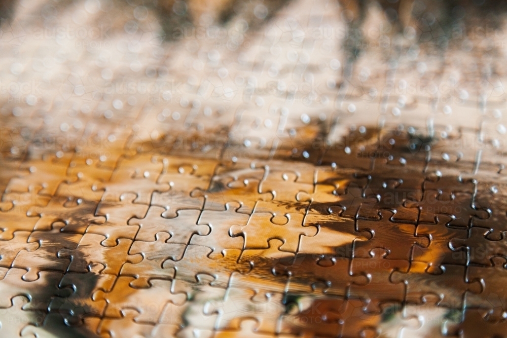 Image of Pieces of a puzzle all joined together filling the frame ...