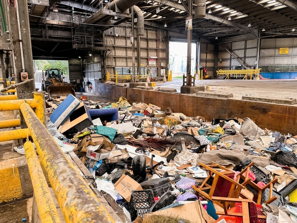 Image of piles of garbage at a dump facility - Austockphoto