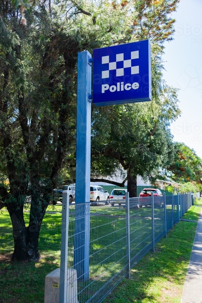 Image of Police sign outside station along the street - Austockphoto