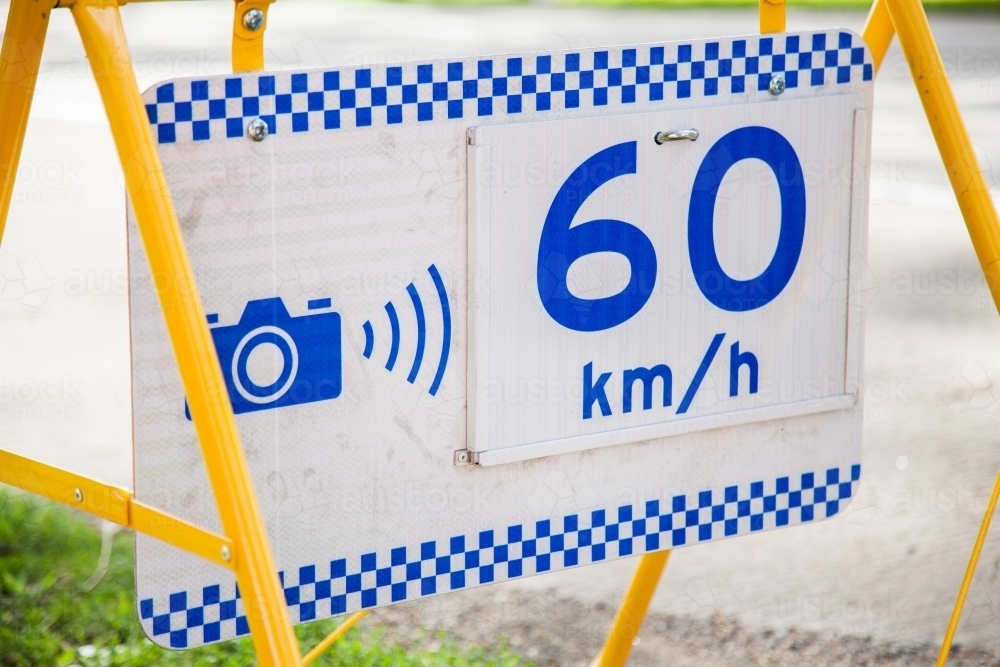Image of Police speed camera 60 km speed zone sign beside highway ...