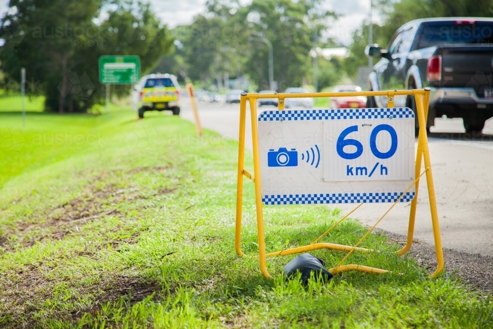 Image of Police speed camera 60 km speed zone sign beside highway ...