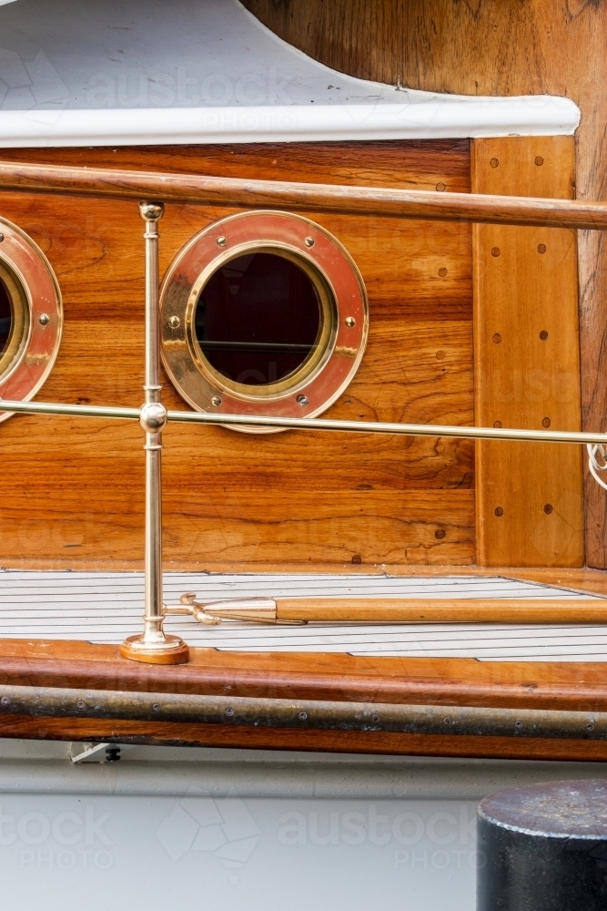 Image of Porthole and railings on wooden boat - Austockphoto