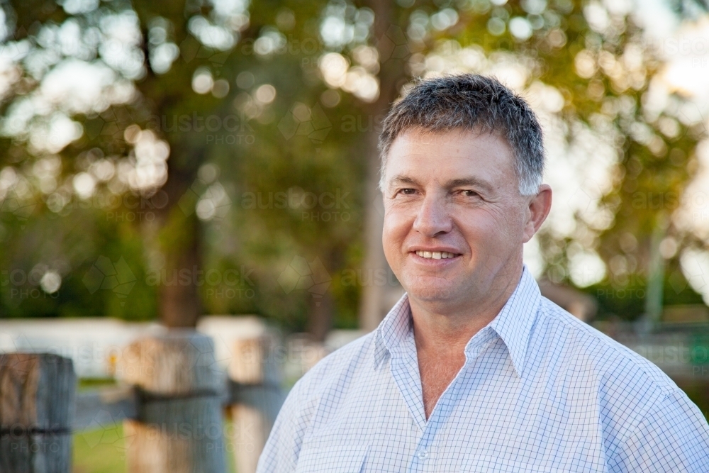 Image of Portrait of a happy middle aged Australian man outside ...