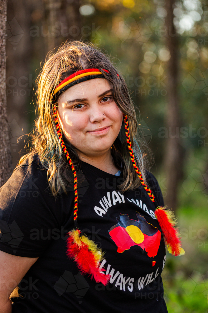 Image of Portrait of Aboriginal Australian teenaged girl in golden ...