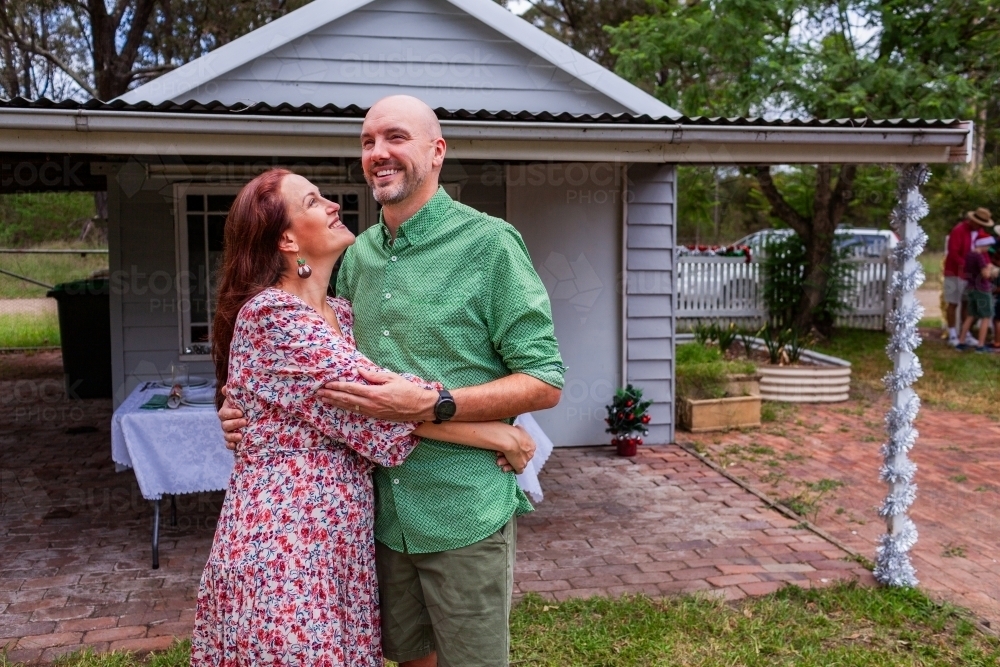 Image of Portrait of Aussie couple in their forties in front of country ...