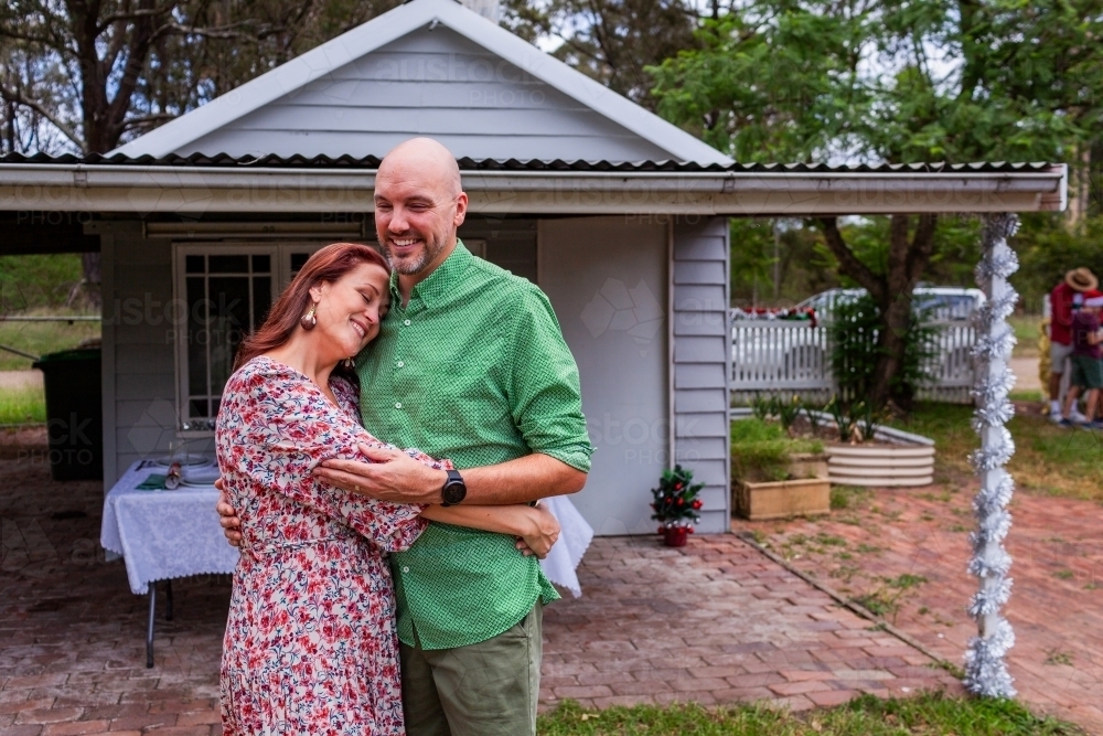 Image of Portrait of Aussie couple in their forties in front of country ...