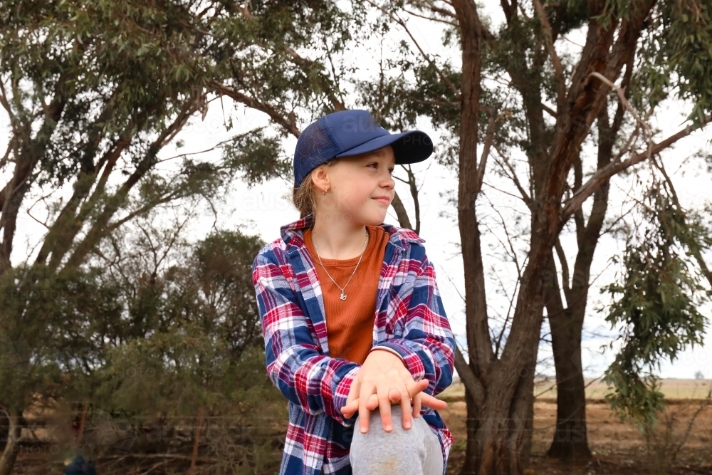 Image of Portrait of country girl on Aussie farm - Austockphoto