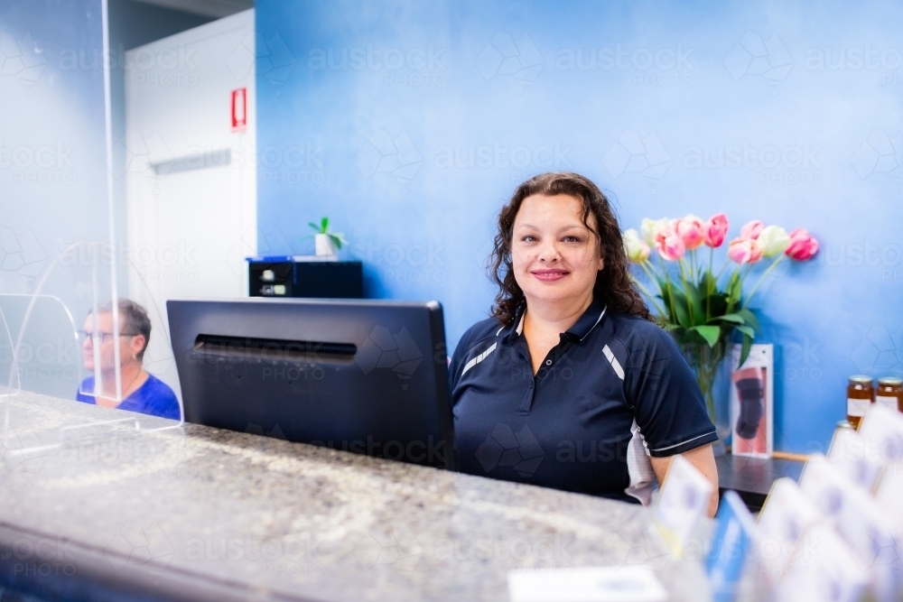 Image of Portrait of female receptionist working at physiotherapist ...
