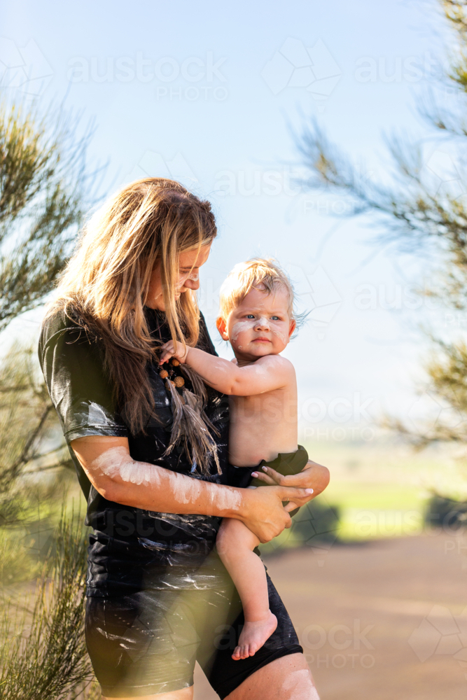 Image of Portrait of first nations Australian mother with baby son by ...