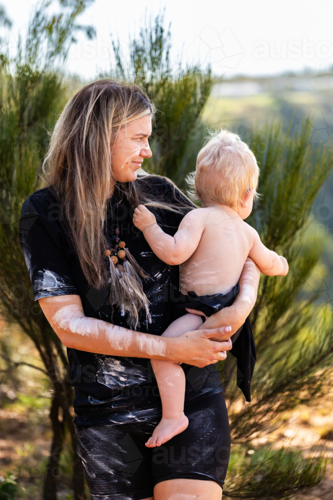 Image of Portrait of first nations Australian mother with baby son by ...