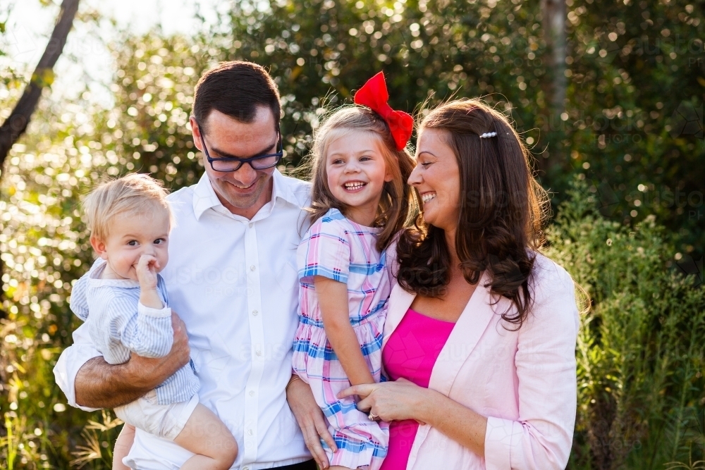Image of Portrait of happy family of four with two children and parents ...