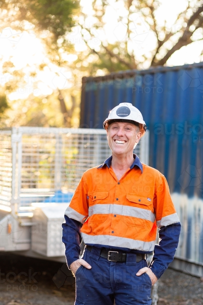 Image of Portrait of happy smiling handyman tradie with protective ...