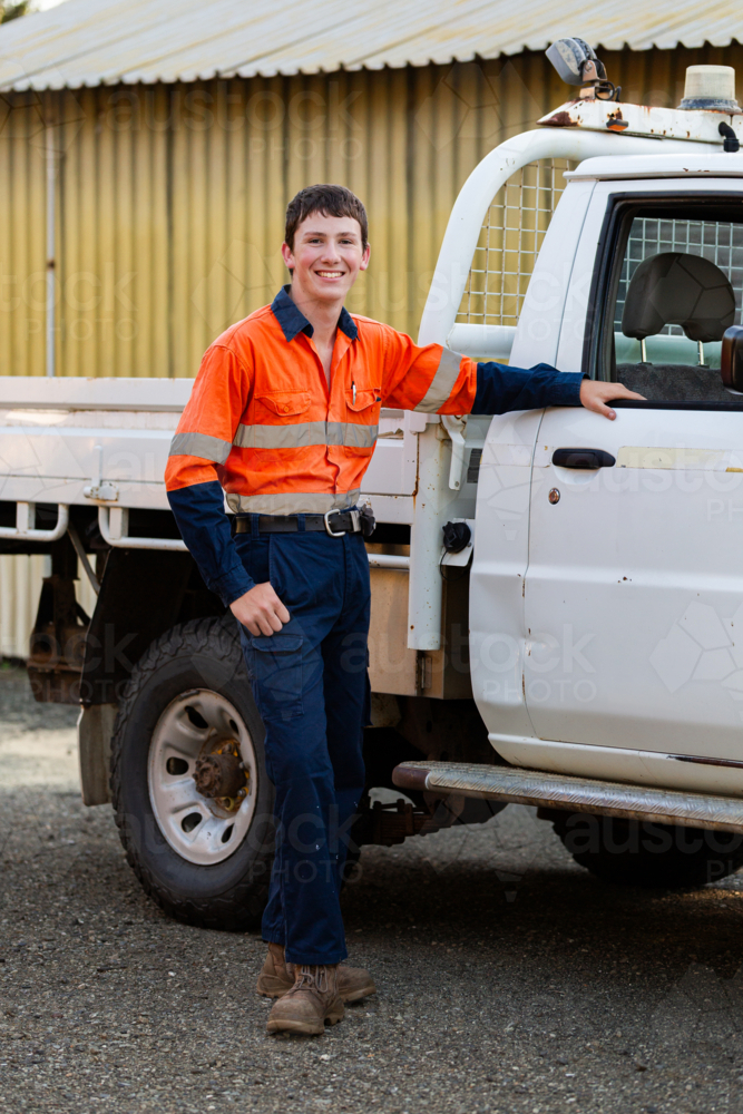 Image of Portrait of happy smiling teenaged young Aussie man in high ...