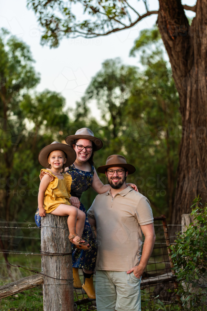 Image of Portrait of happy young Australian family of three together by ...
