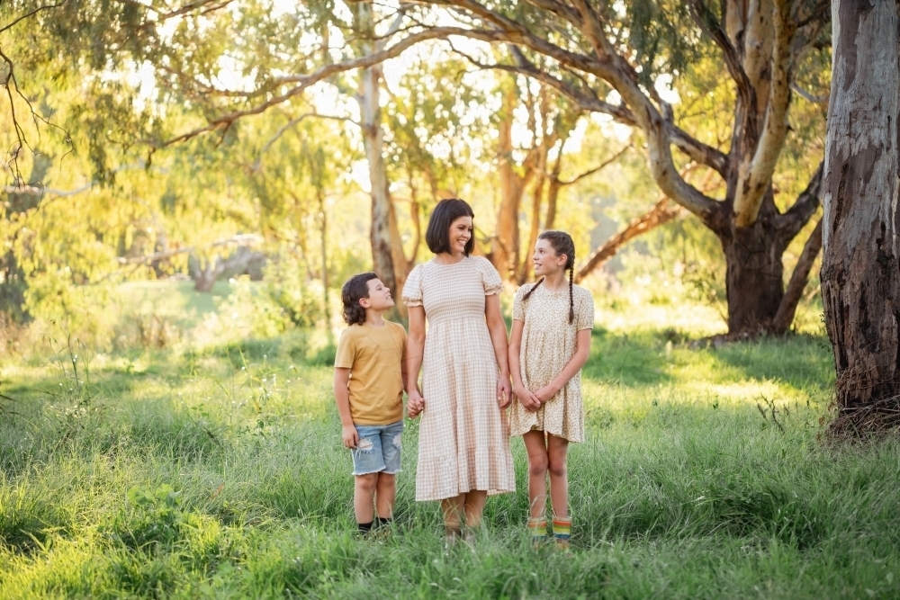 Image of Portrait of mother and children together in Australian bush ...
