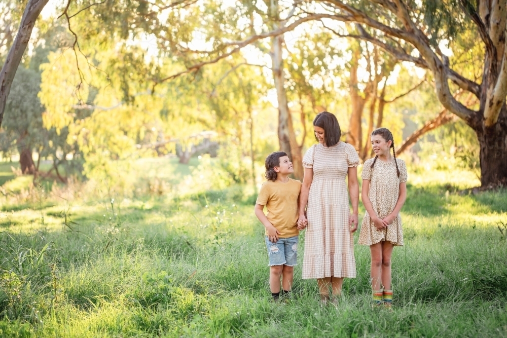 Image of Portrait of mother and children together in Australian bush ...