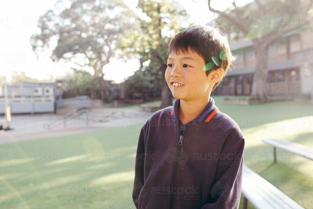 Image of Portrait of primary school boy in the playground at school ...