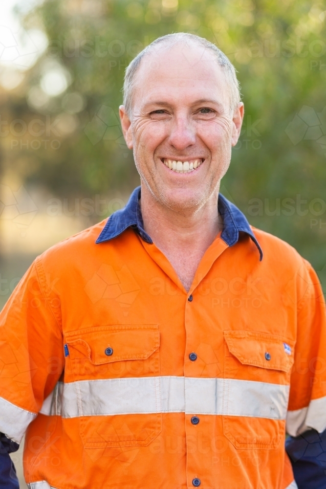 Image of Portrait of smiling middle aged professional engineer ...