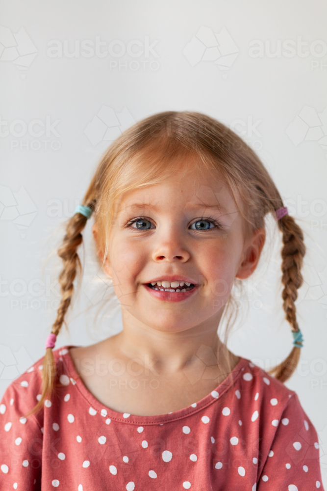 Image of Portrait of smiling young Australian Caucasian child on white ...