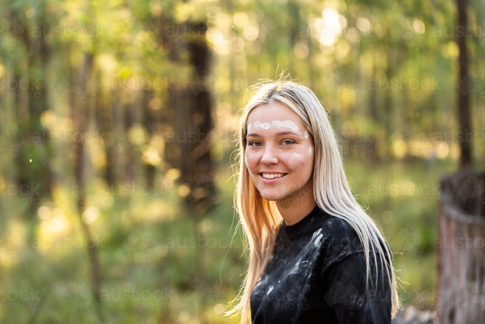 Image of Portrait of smiling young First Nations Australian woman with ...