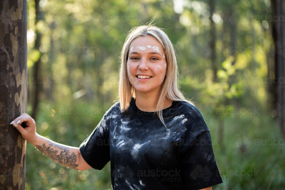 Image of Portrait of smiling young First Nations Australian woman with ...