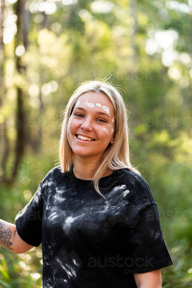 Image of Portrait of smiling young First Nations Australian woman with ...