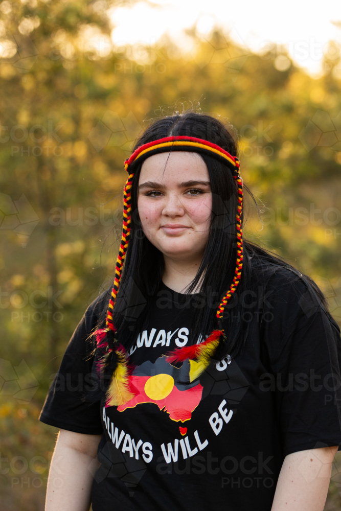 Image of Portrait of thirteen year old aboriginal girl with dark hair ...
