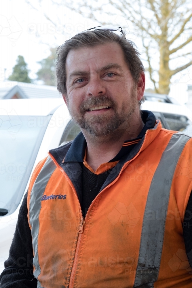 Image of Portrait of tradie wearing workwear - Austockphoto
