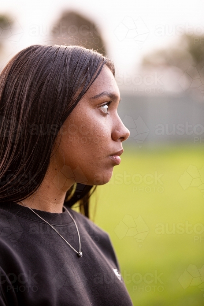 Image of Portrait of young First Nations woman - Austockphoto