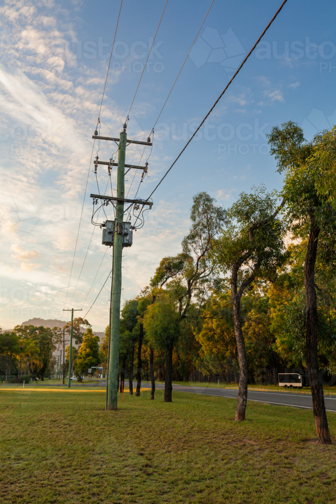 Image of power poles and powerline infrastructure supplying rural ...
