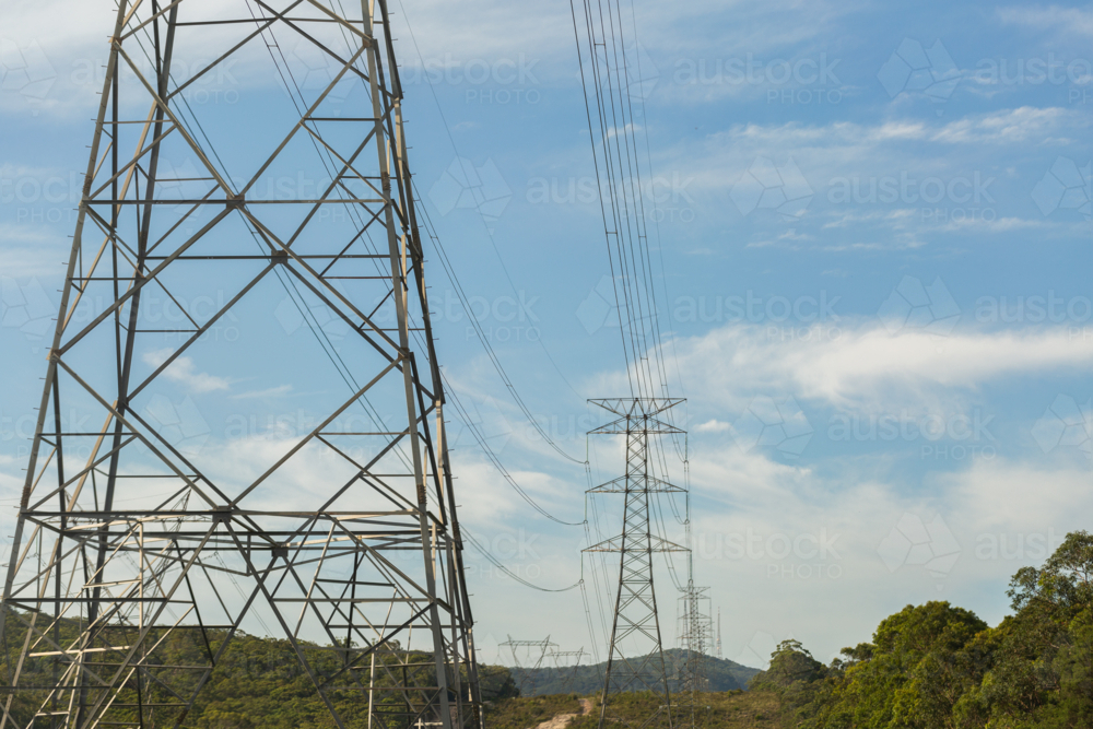 Image of Powerlines and electricity poles going across landscape ...