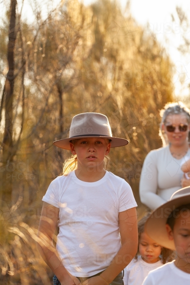 Image of Pre-teen country kid with family on bushwalk - Austockphoto