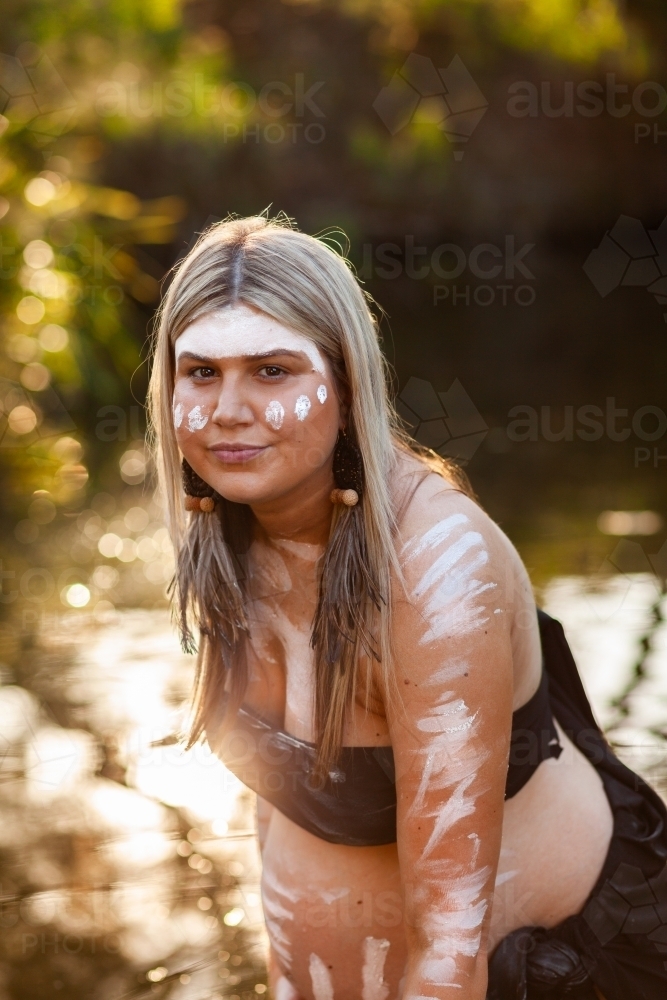 Image Of Pregnant Aboriginal Australian Woman In Sparkling Creek Water