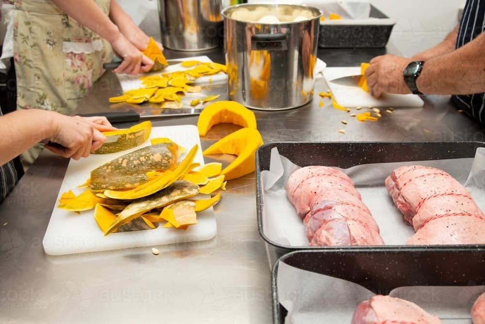 Image of Preparing food for community meal - Austockphoto