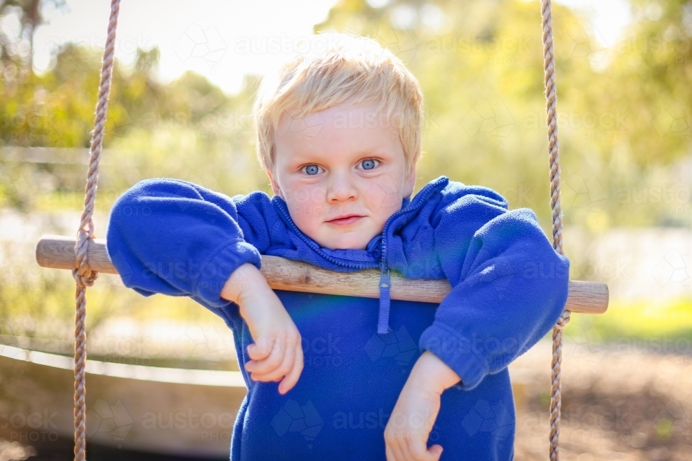 Image of Preschool age boy posing for kindy photos on rope ladder at ...