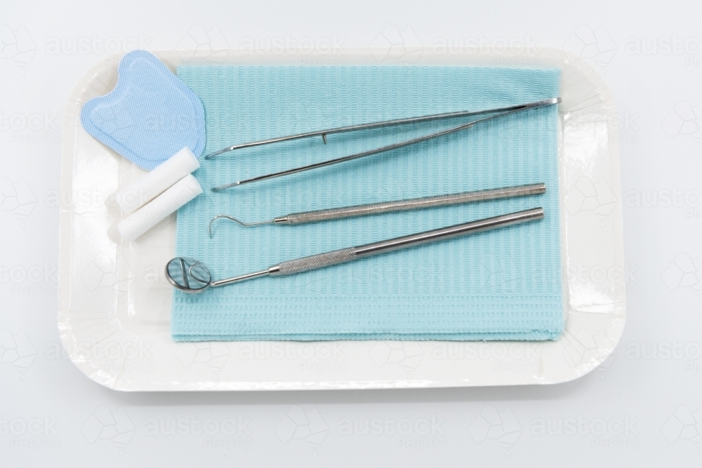 Image of Professional dental instruments on white background - Austockphoto
