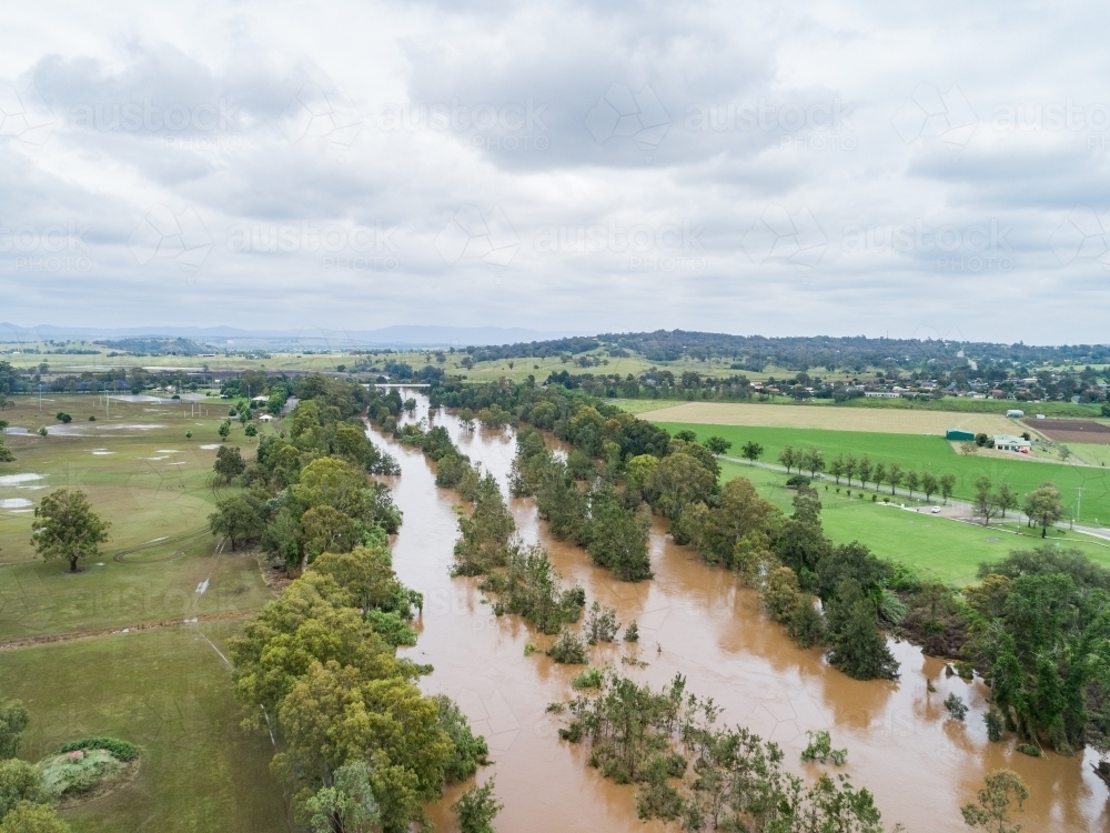 Image of Receding floodwaters in river in the aftermath of a flood ...