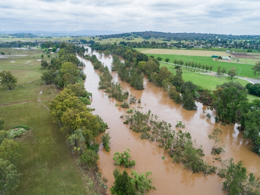 Image of Receding floodwaters in river in the aftermath of a flood ...