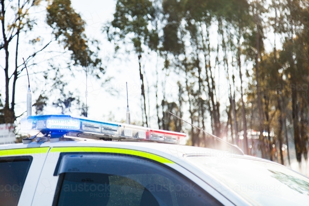 Image of Red and blue flashing lights on top of emergency service ...