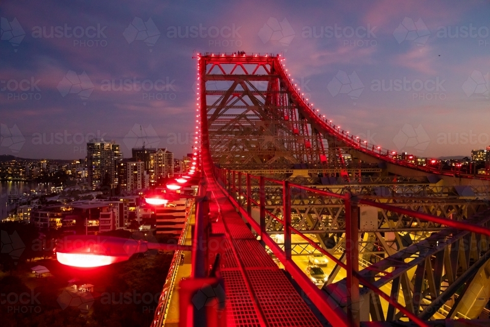 Image of Red illuminated lights along the structure of the Story Bridge ...