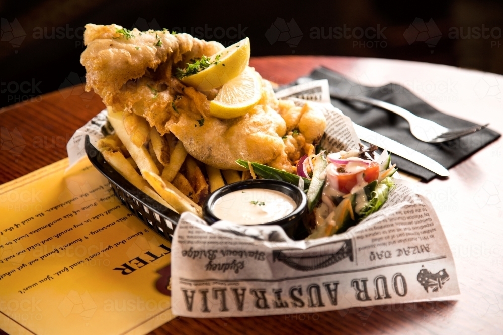 Image of Restaurant meal of fish and chips - Austockphoto