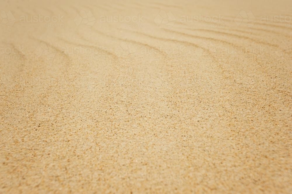 Image of ripple pattern in sand at the beach - Austockphoto