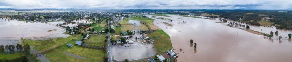 Image of River with broken banks during flood with floodwater covering ...