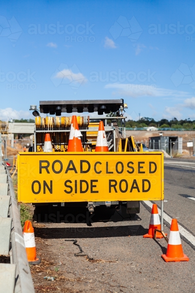 Image of Road closed on side road sign near construction site ...