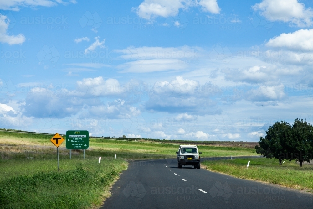 Image of Road out of small country town with sign to Merriwa, Newcastle ...