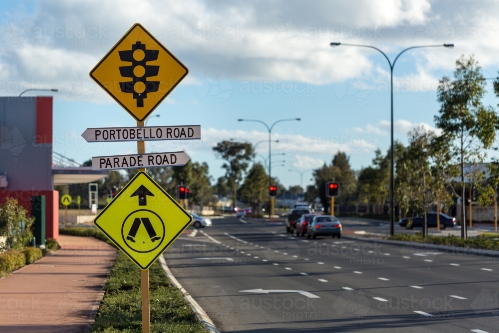 Image of Road signs at suburban intersection - Austockphoto