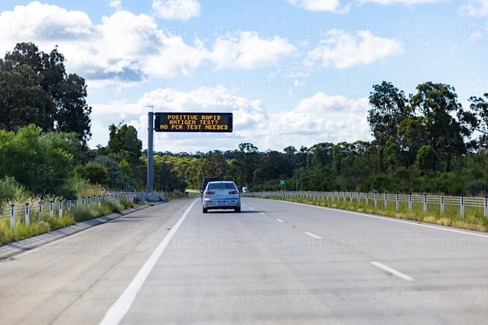 Image of Roadside digital sign - Positive rapid antigen test? no PCR ...
