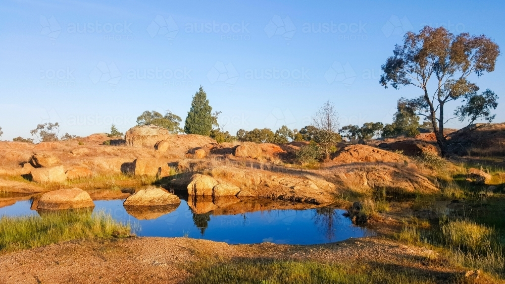 Image of Rock pool water hole on sunny afternoon in the Terrick Terrick ...